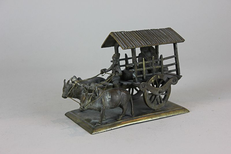 An Indian brass model of oxen pulling a - auctions & price archive